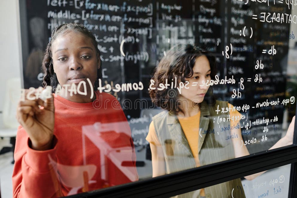 Teacher Writing Codes on Blackboard with Student Stock Image - Image of ...