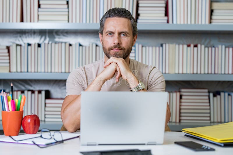 Teachers Day. Teacher Tutor Using Laptop in School Classroom. Knowledge ...