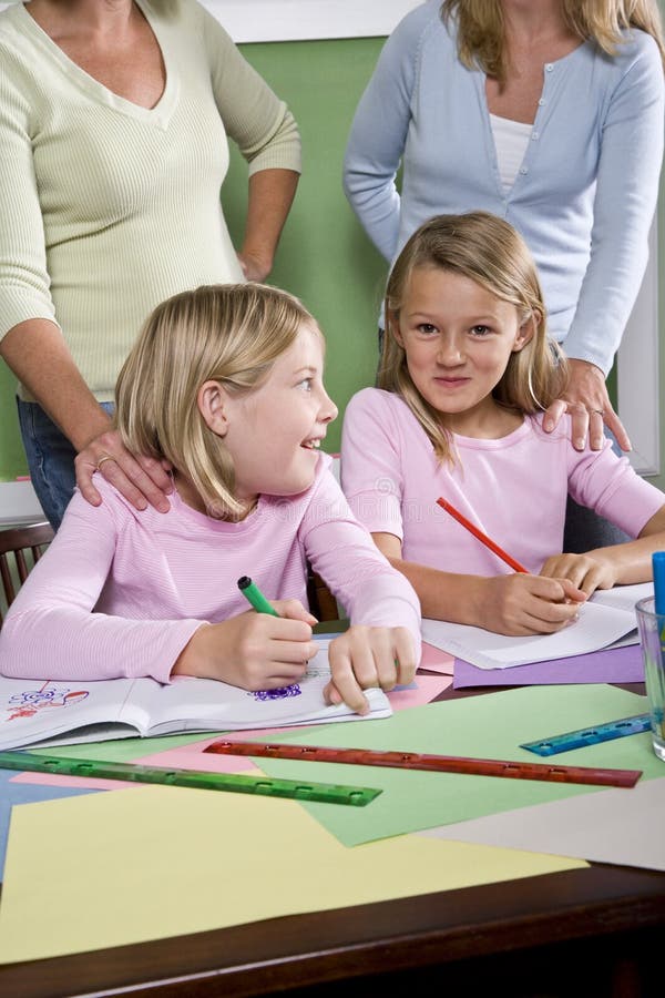 Teachers and Students in Classroom Stock Image - Image of cheerful ...