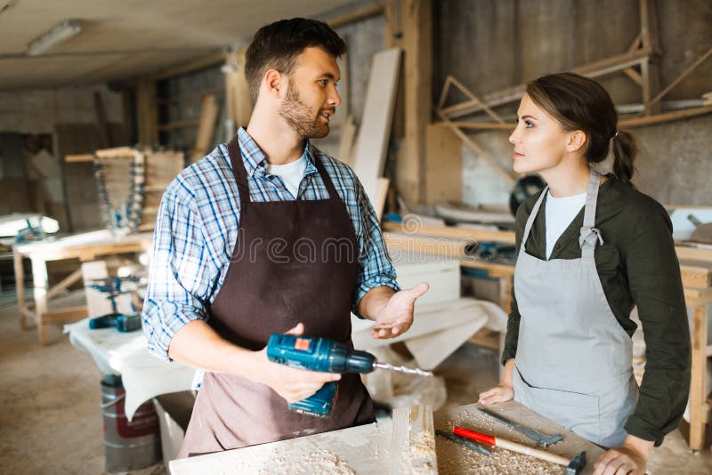 Teaching Apprentice To Use Drill Press Stock Image - Image of showing ...