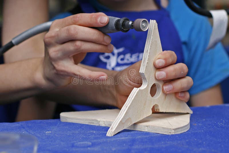 Teaching a Child Woodcarving Stock Photo - Image of activity, manual ...
