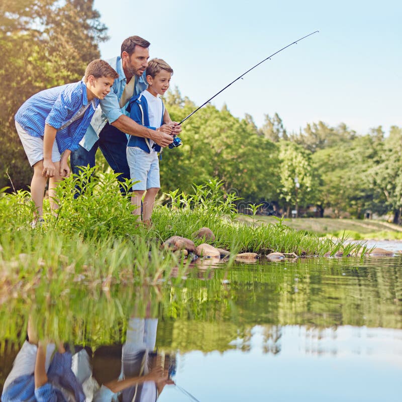 Father Teaching Kids To Fish Stock Photos - Free & Royalty-Free Stock ... Father Teaching Kids To Fish Stock Photos - Free & Royalty-Free Stock ...