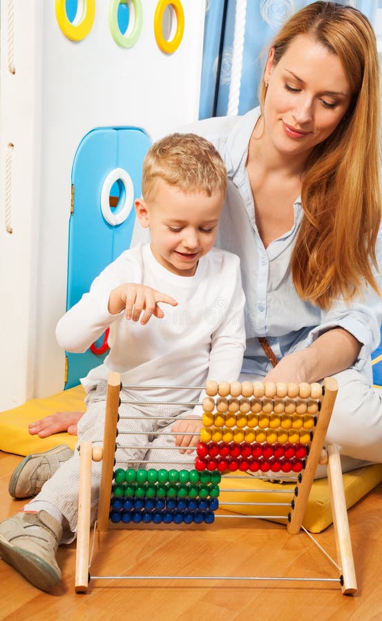 Teaching math stock image. Image of family, home, game - 28724735