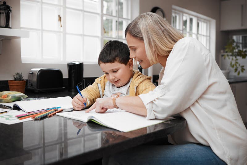 Teaching, Mother and Child with Homework in Kitchen for School Task, Creative Development or ...