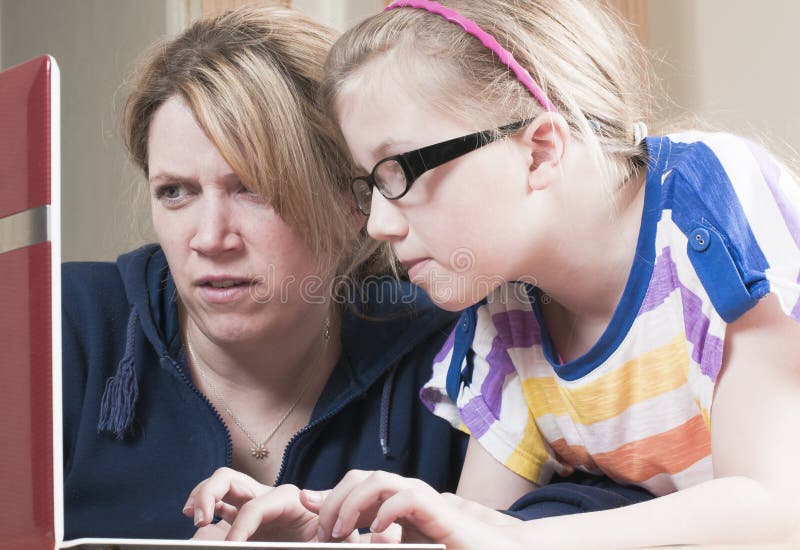 Mother Teaching Her Children How To Use A Computer Stock Photo - Image ... Mother Teaching Her Children How To Use A Computer Stock Photo - Image ...