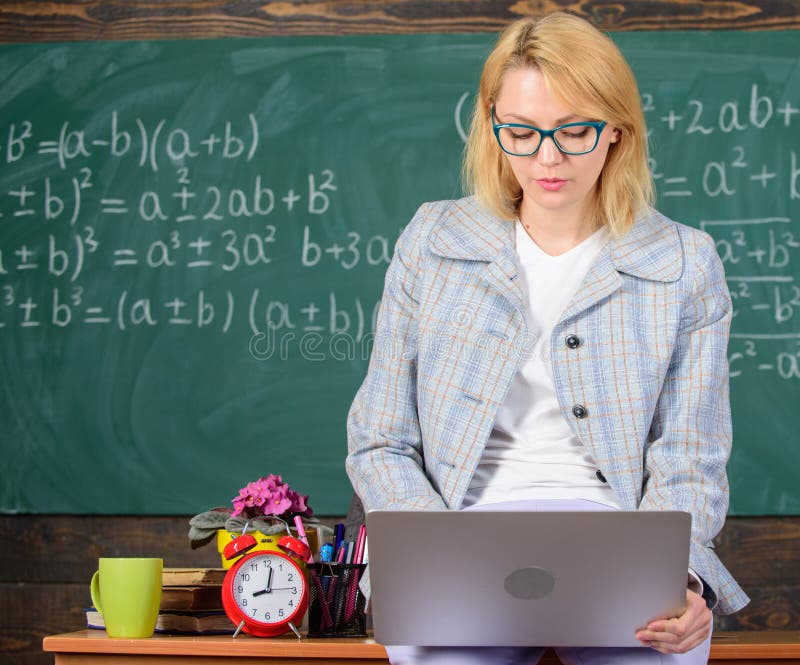 Teaching in Non Formal Atmosphere. Woman Teacher Hold Laptop Sit Table ... Teaching in Non Formal Atmosphere. Woman Teacher Hold Laptop Sit Table ...