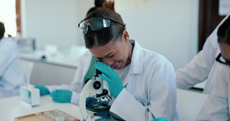 Teaching, Science and Students in Laboratory with Microscope for ...