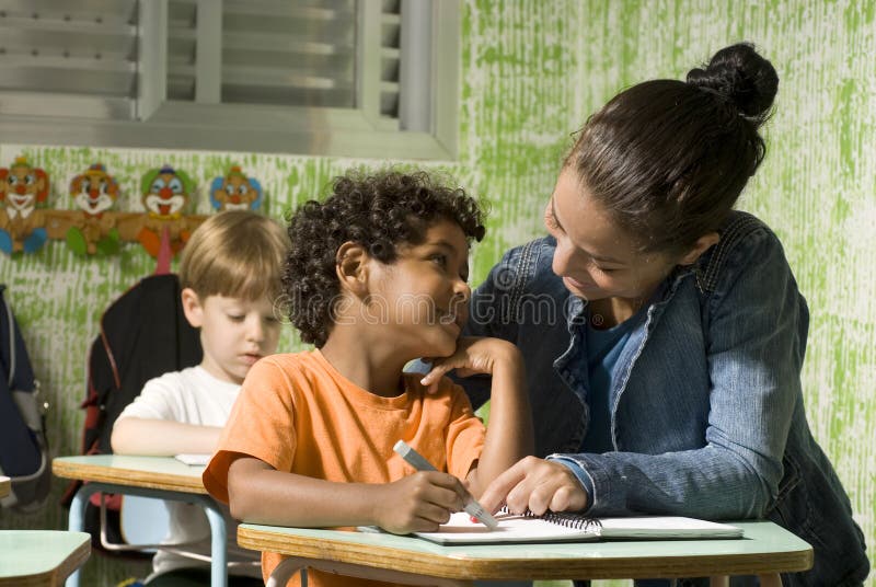 Teaching with Student stock image. Image of seated, education - 6413157