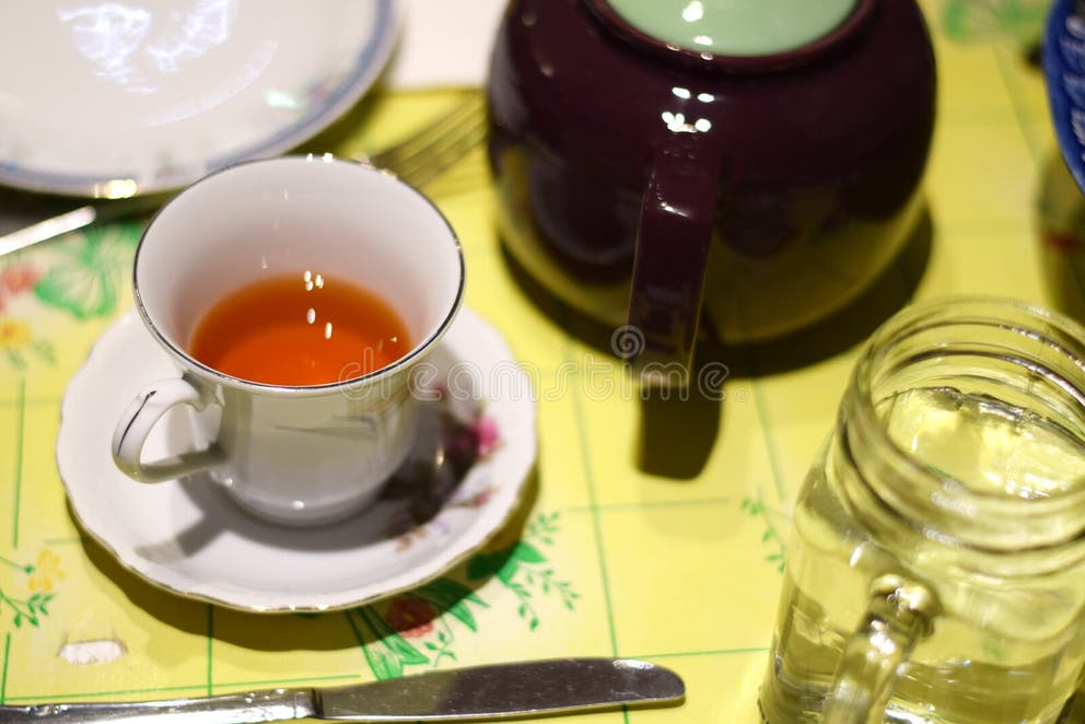 Teacup on table stock photo. Image of alice, oolong, table - 78589778
