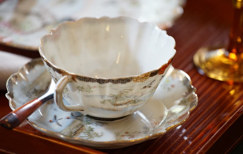 Teacup on the table stock photo. Image of table, scene - 136243216
