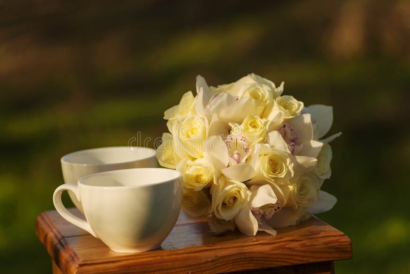 Teacups and bouquet stock image. Image of outdoor, anniversary - 56468863