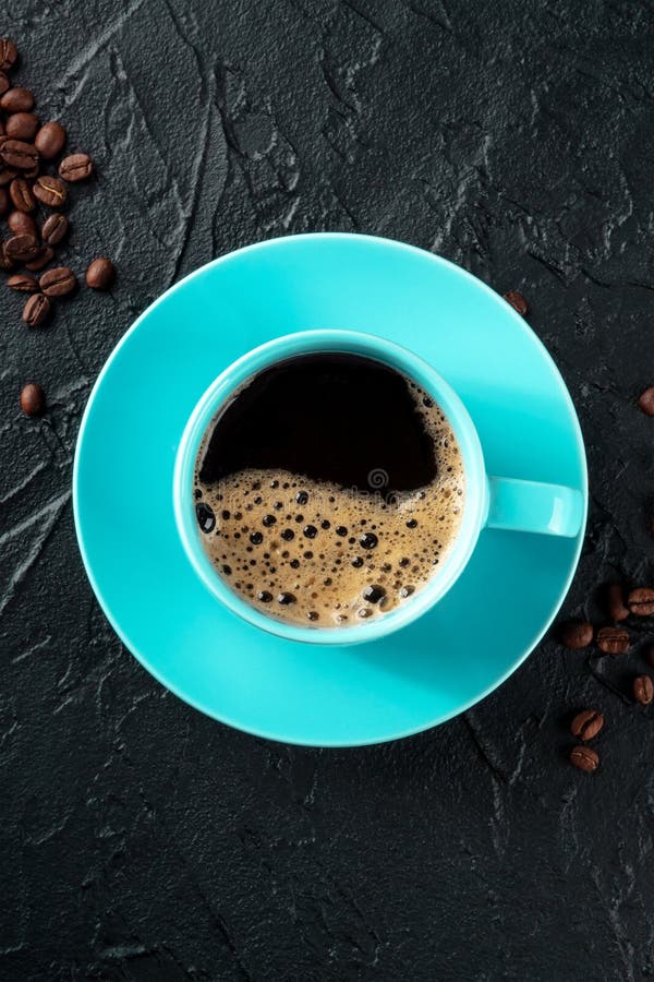 Teal Coffee Cup and Coffee Beans, Top Shot on a Black Background Stock ...