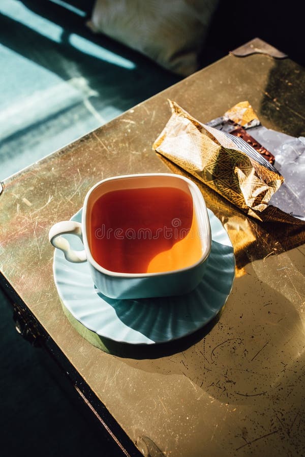 Teal and Gold Teacup and Chocolate Stock Image - Image of teacup, brown ...