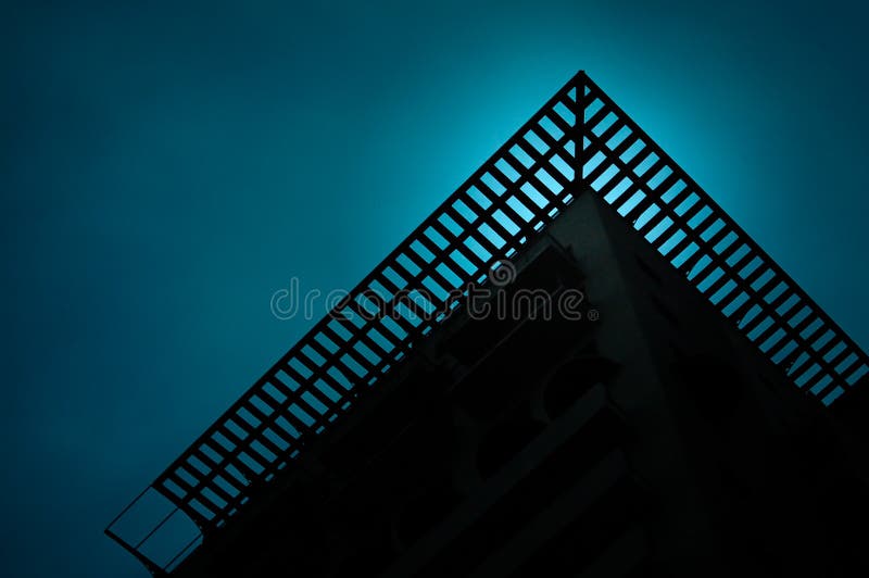 Teal Moonlight through Rooftop Structure Stock Photo - Image of ...
