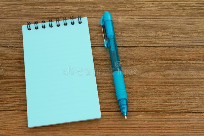 Teal Notepad and Pen on Weathered Wood Stock Photo - Image of people ...