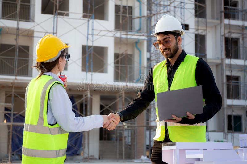 Team Architect or Engineer Holding Laptop Looking Model House and Doing Agreement while ...