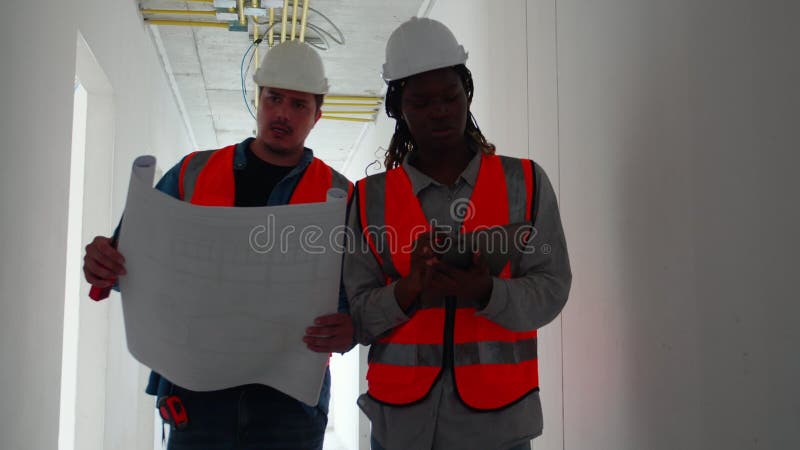 Team of Architect or Engineer Looking Laptop Computer for Inspection ...