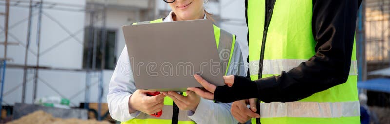 Team of Architect or Engineer Looking Laptop for Inspection and ...