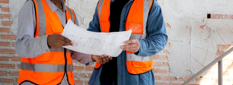 Team of Architect or Engineer Wearing Hardhat Looking Blueprint for ...