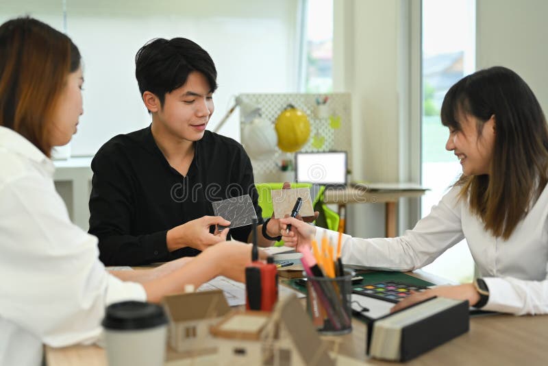 Team of Architect Sharing Idea and Planning Construction Project ...