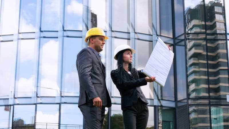 Team of Architects and Engineer in Group on Construciton Site Check ...