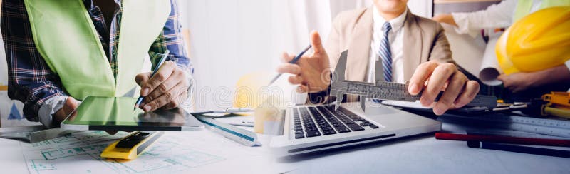 Team of Architects or Engineering Consulting and Analyzing Working on ...