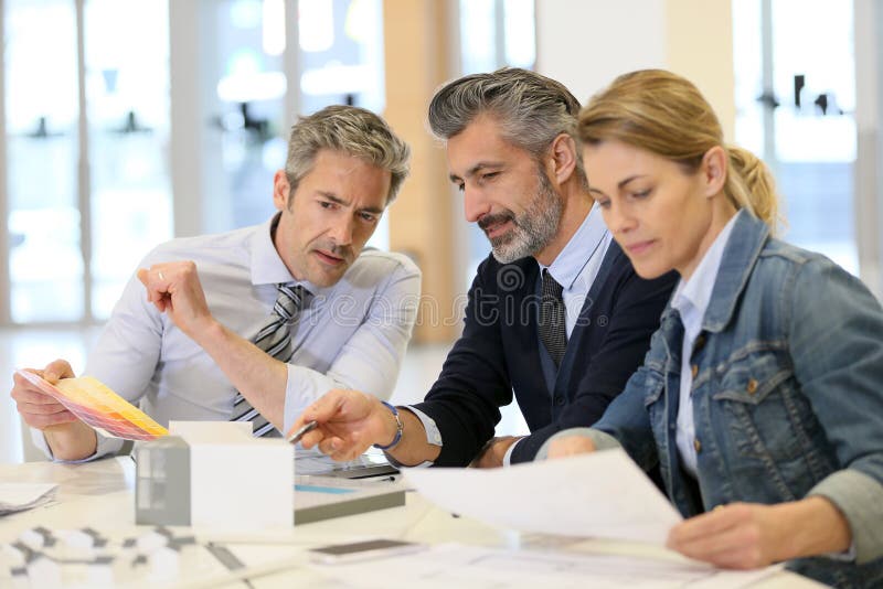 Team of Architects Handling New Construction Project Stock Photo ...