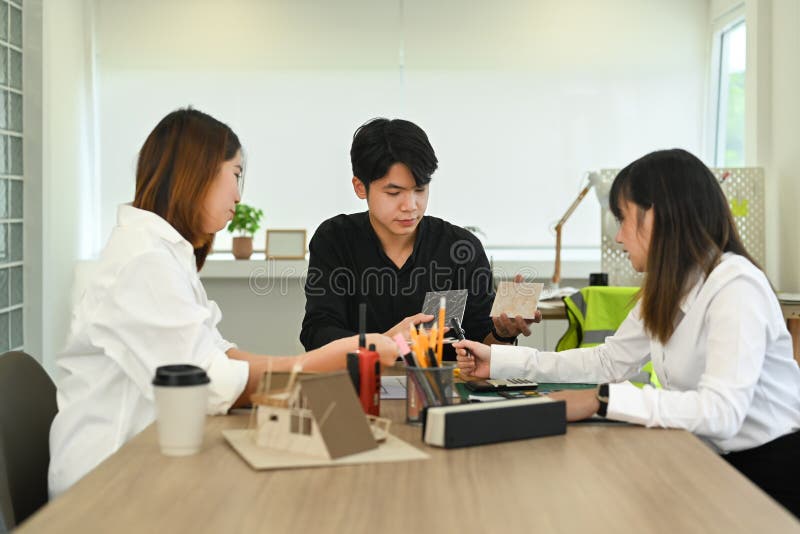 Team of Architects and Inspector Supervising Progress of Construction ...