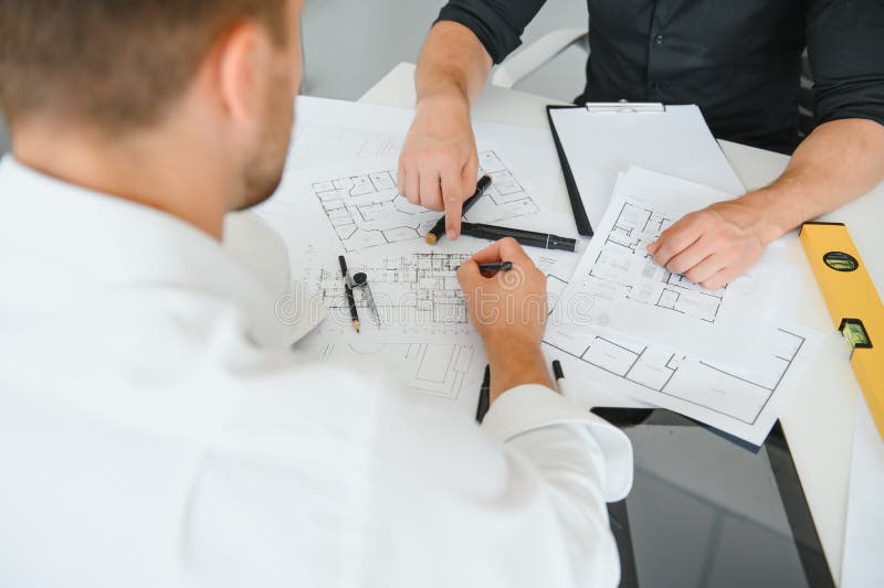 Team of Architects People in Group on Construciton Site Check Documents ...