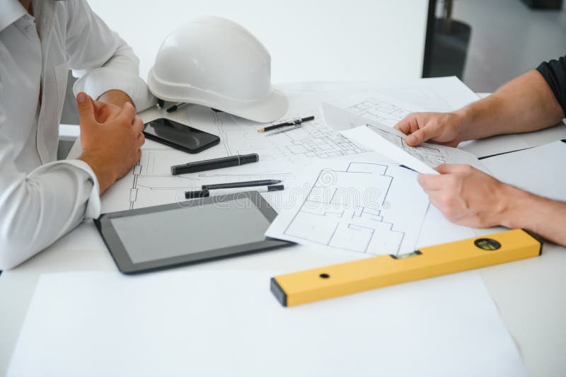 Team of Architects People in Group on Construciton Site Check Documents ...