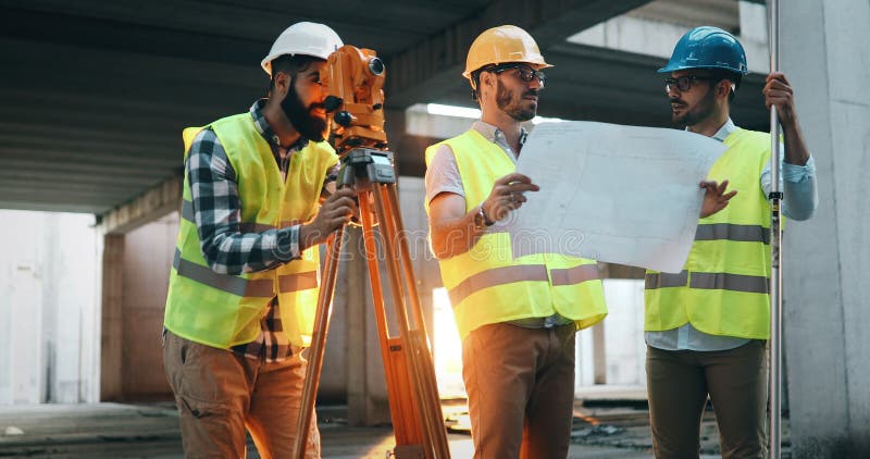 Team of Architects People in Group on Construciton Site Stock Image ...