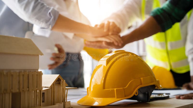 Team Architects Workers, Men and Women, Join Hands To Join Forces To ...