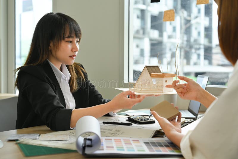 Team of Architects Working Together on Design of a Construction Plan ...