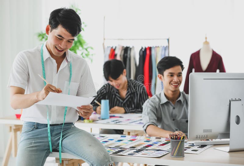 Team of Asian Designers Working in Tailor Workshop Stock Image - Image ...