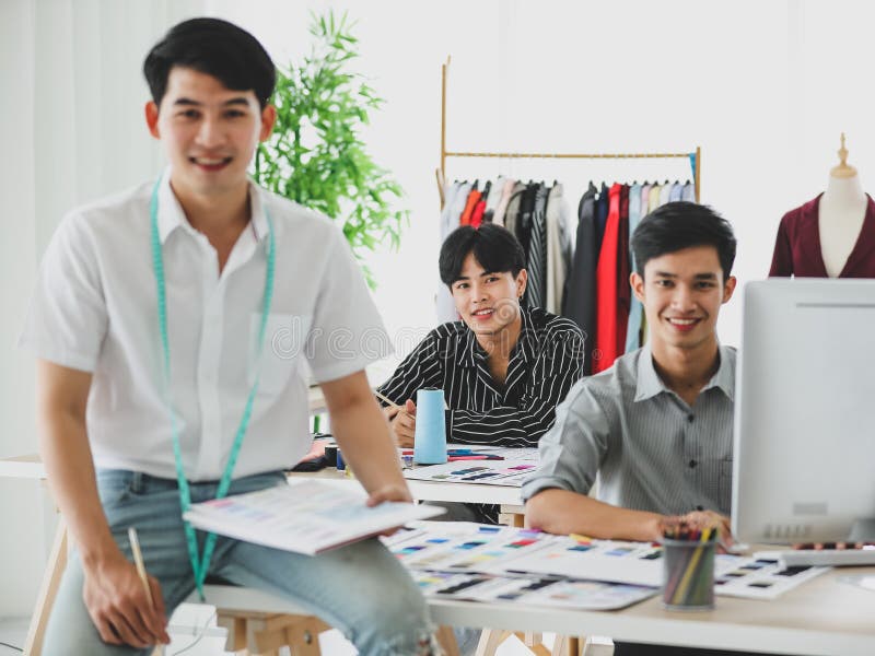 Team of Asian Designers Working in Tailor Workshop Stock Image - Image ...