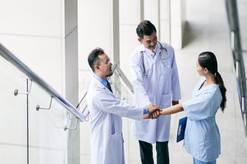 Supportive colleagues stock image. Image of vietnamese - 109455481