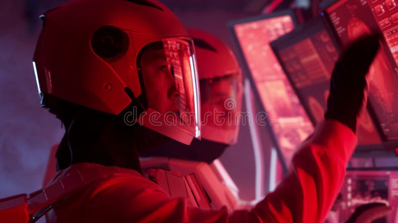 Team of Astronauts in a Space Suits Aboard the Mars Station. a Crew of ...