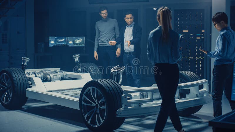 Team of Automotive Engineers Working on Electric Car Chassis Platform ...