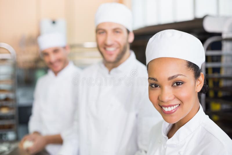 Team of Bakers Smiling at Camera Stock Image - Image of drink, kitchen ...