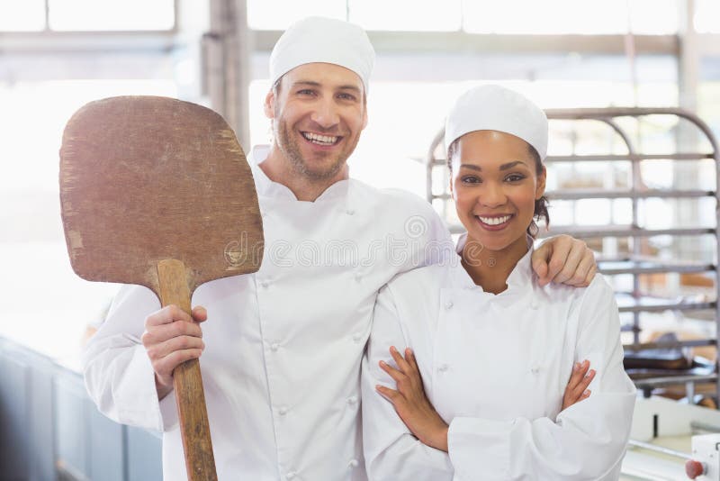 Team of Bakers Smiling at Camera Stock Image - Image of female ...