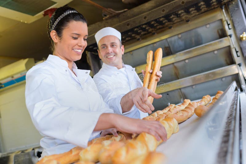 Team Bakers Working at Bakery Stock Photo - Image of oven, team: 160146980