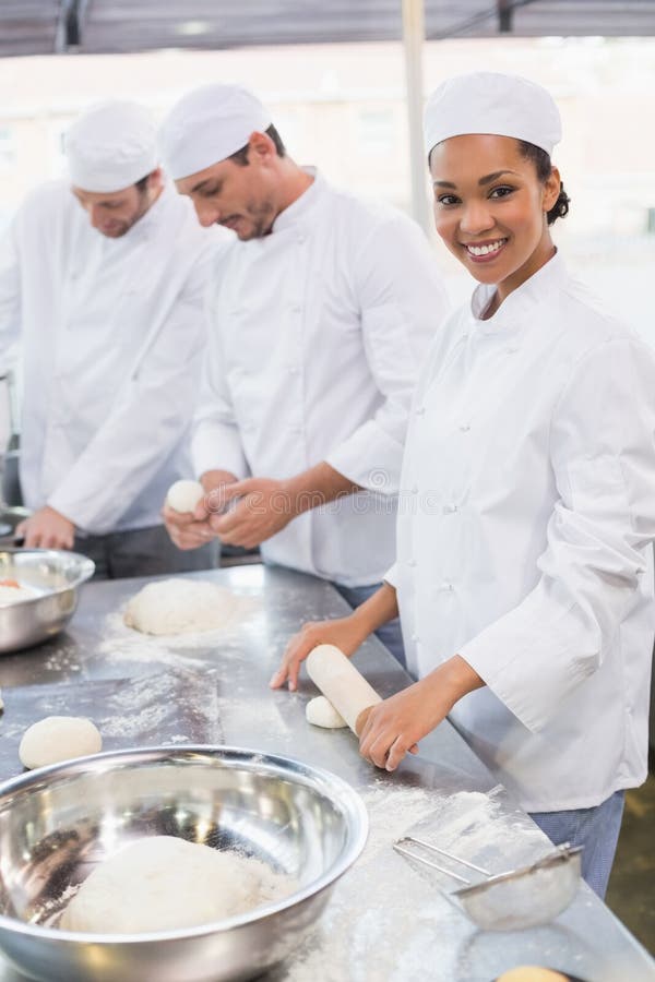 Team of Bakers Working at Counter Stock Photo - Image of caucasian ...