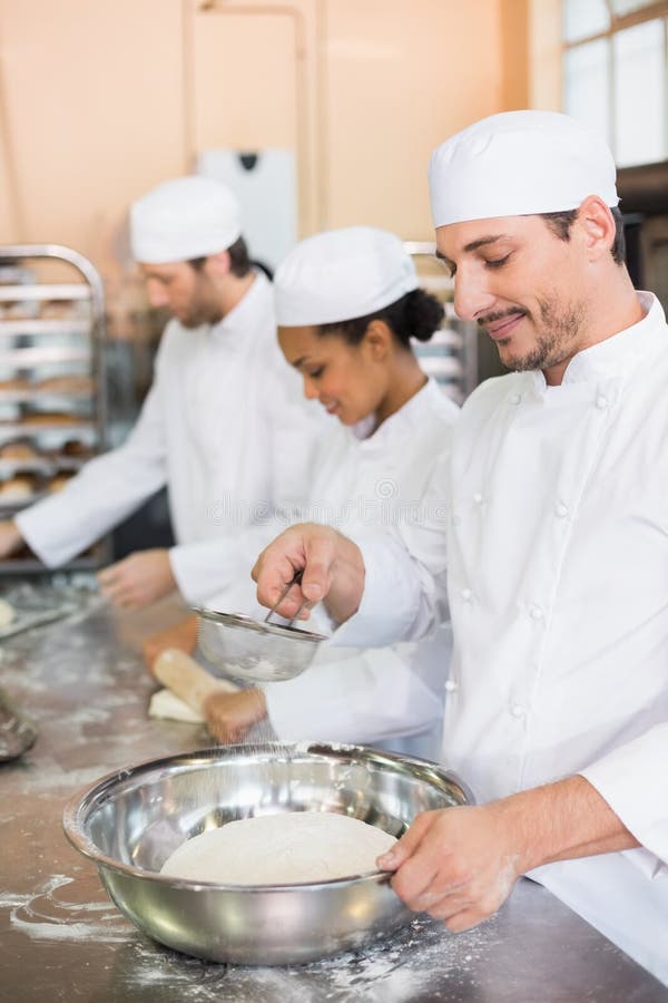 Team of Bakers Working at Counter Stock Photo - Image of coworkers ...