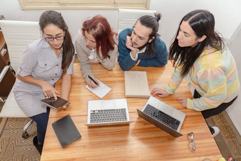 Team Brainstorming Session with Digital Devices. Zenithal and Angular ...