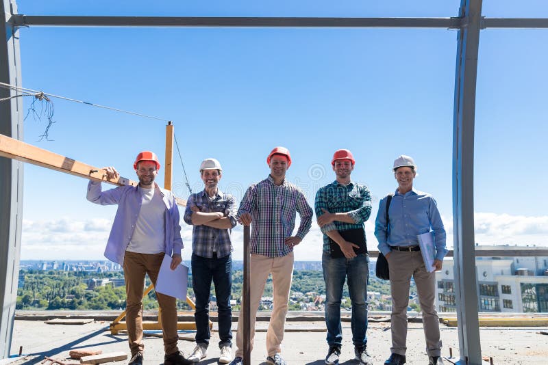 Team of Builders on Costruction Site, Happy Smiling Foreman Group in ...