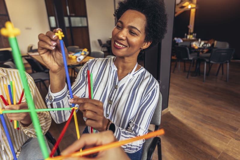 Team Building Activities in the Office with Sticks. Stock Image - Image ...