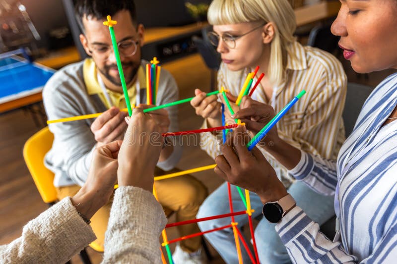 Team Building Activities in the Office with Sticks. Stock Photo - Image ...