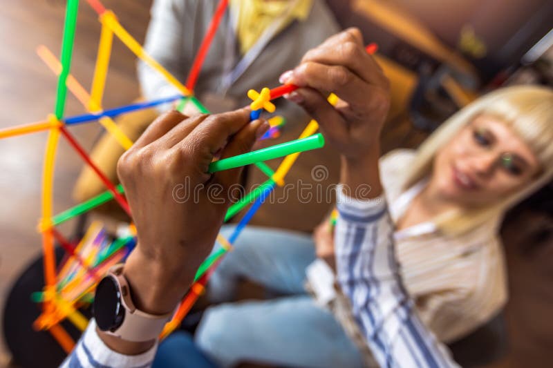 Team Building Activities in the Office with Sticks. Stock Image - Image ...