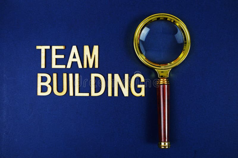 Team Building Alphabet Letters with Magnifying Glass on Navy Blue ...