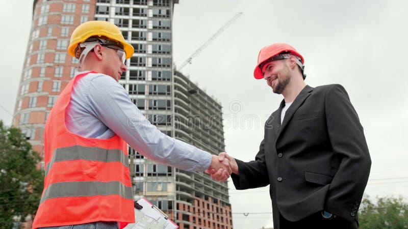 Team of Building Professionals Greeting Each Other before Site ...